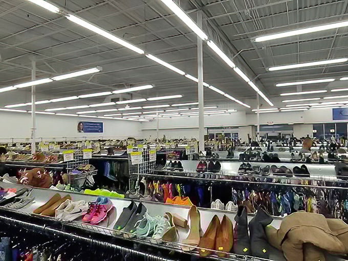A sea of shoes stretches to the horizon. In this footwear library, someone's once-loved loafers await their second chapter.