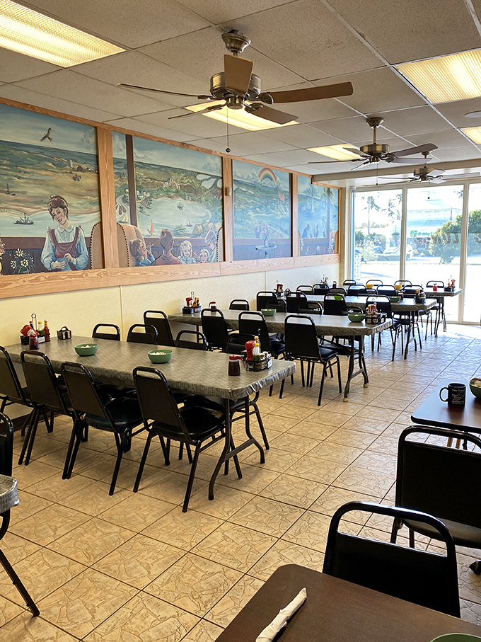 Coastal murals and no-nonsense tables create that perfect "come as you are" atmosphere where conversations flow as freely as the coffee.