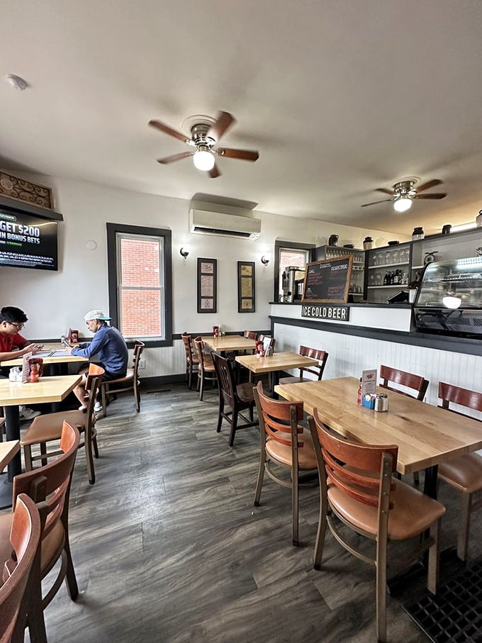 Inside, wooden tables and classic diner chairs create that perfect "everybody knows your name" atmosphere that makes breakfast taste better.