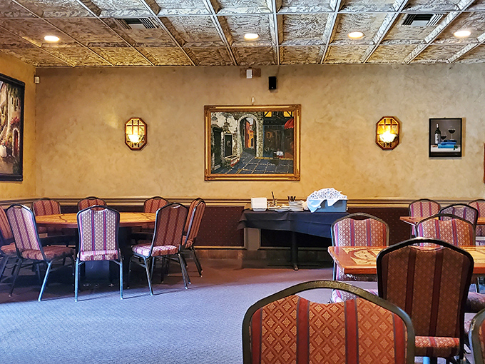 Warm amber walls, ornate tin ceilings, and cozy seating create that rare atmosphere where you instantly know the food will match the ambiance&mdash;authentically Italian.
