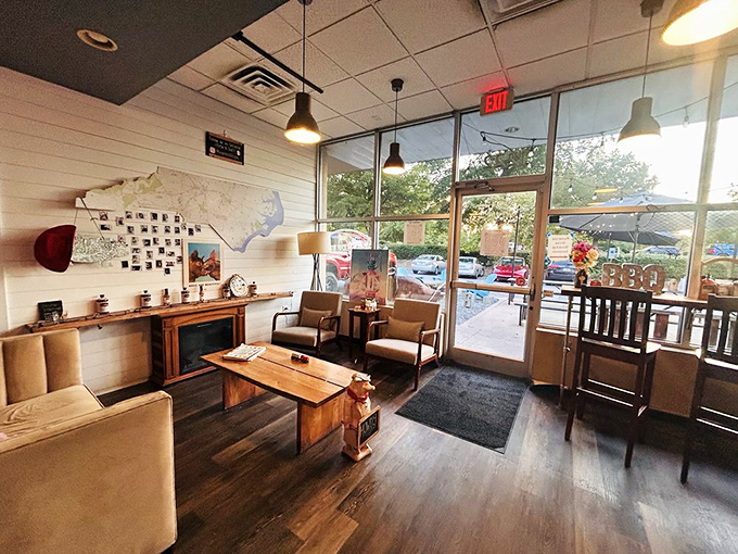 A cozy lounge area where barbecue dreams begin. That map on the wall? It's basically the United States of Deliciousness.