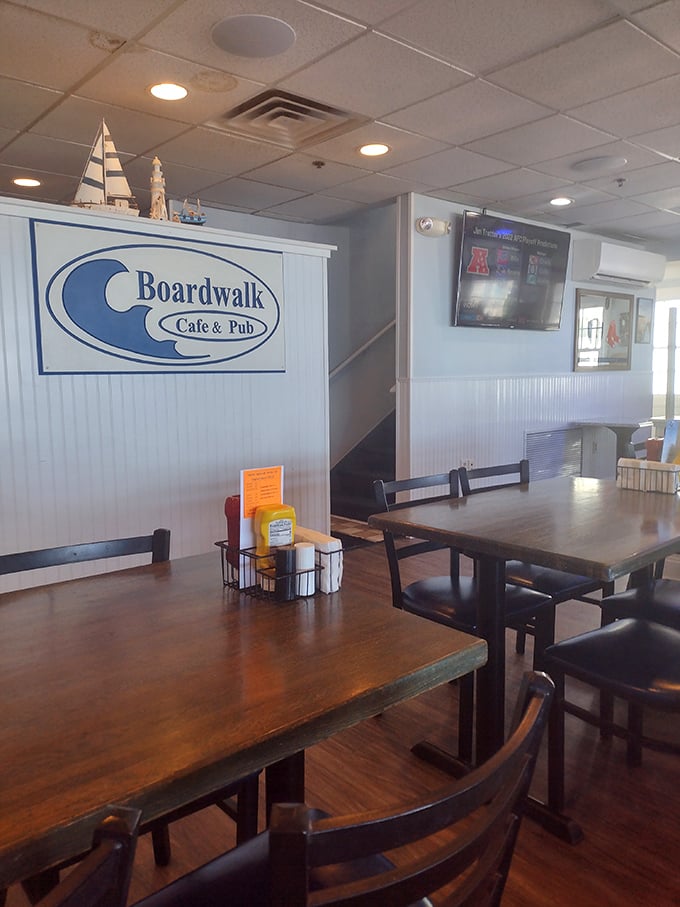 Inside, nautical charm meets cozy comfort. Those model sailboats aren't just decoration&mdash;they're a promise of the seafaring delights about to dock at your table.