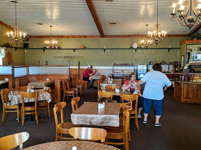 Wooden tables, warm lighting, and the promise of home-cooked abundance &ndash; this dining room doesn't need fancy frills to deliver comfort.