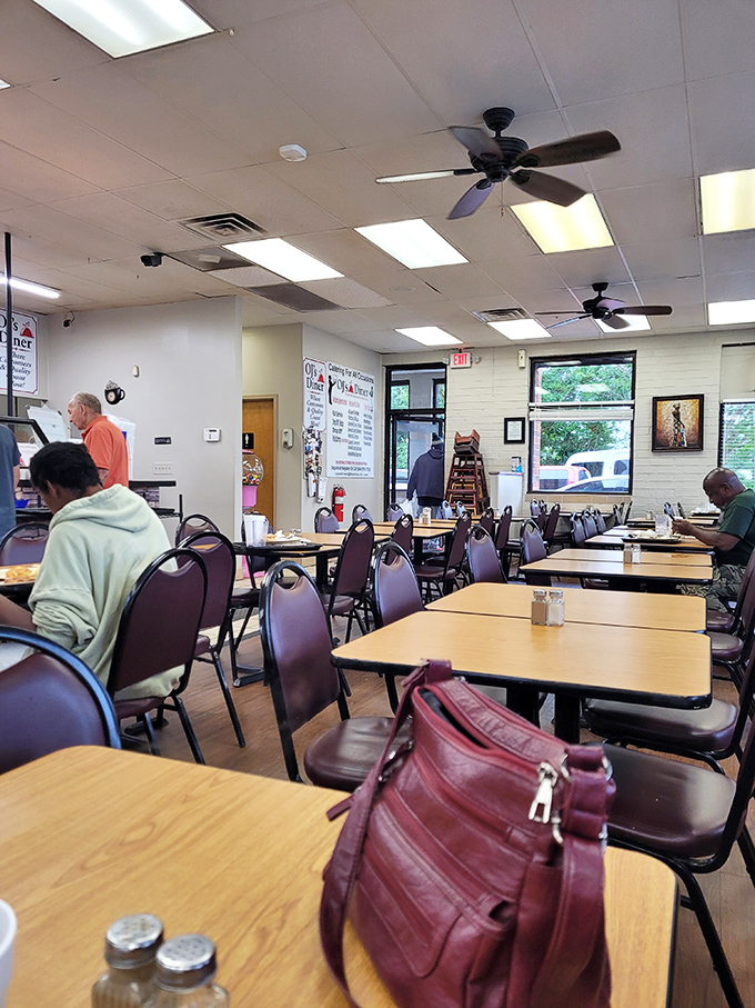 No designer lighting or trendy decor here&mdash;just honest tables, ceiling fans, and the promise of a meal that speaks volumes without saying a word.