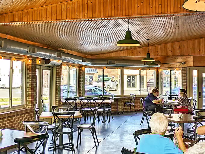 Warm wooden ceilings and industrial lighting create the perfect atmosphere for serious meat contemplation and friendly conversation.