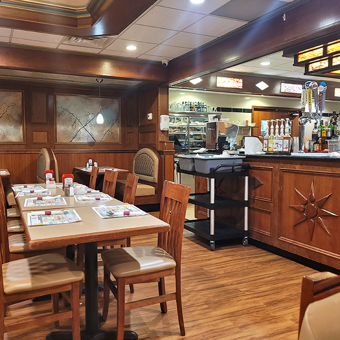 Warm wood paneling and comfortable seating create that perfect diner atmosphere &ndash; like a hug from your favorite aunt who always feeds you too much.