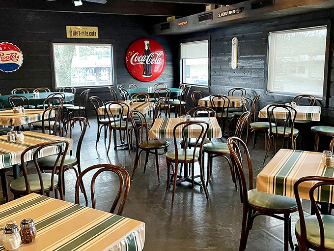 Step inside and time slows down &ndash; vintage Coca-Cola signs, bentwood chairs, and striped tablecloths create the pizza parlor equivalent of a warm hug.