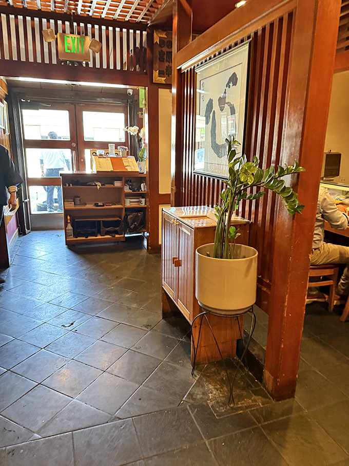 Step inside and the warm wooden interior whispers of tradition, where minimalist Japanese design creates the perfect backdrop for the culinary artistry to come.