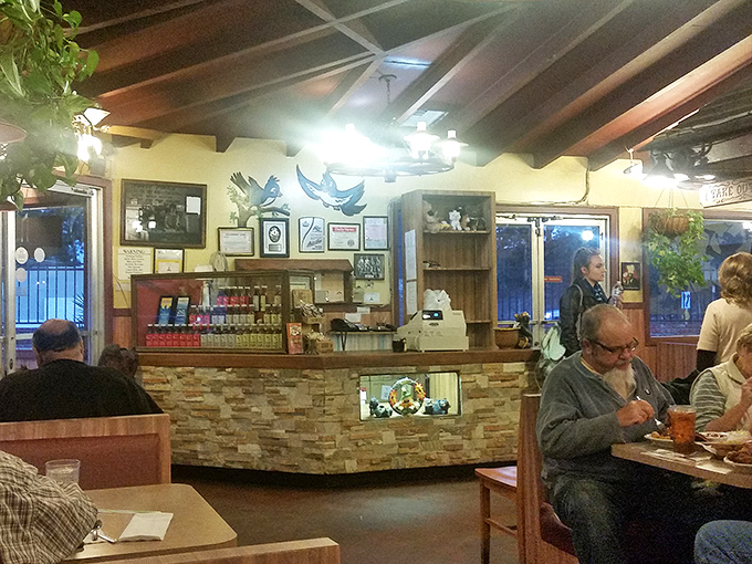 Inside, time stands deliciously still. Wood paneling, memorabilia, and the unmistakable aroma of decades of perfect barbecue create a sanctuary for hungry souls.