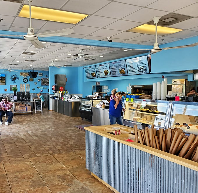 Inside, the bright blue walls and no-nonsense counter service set the stage for what matters most: seafood that'll make you forget your table manners.
