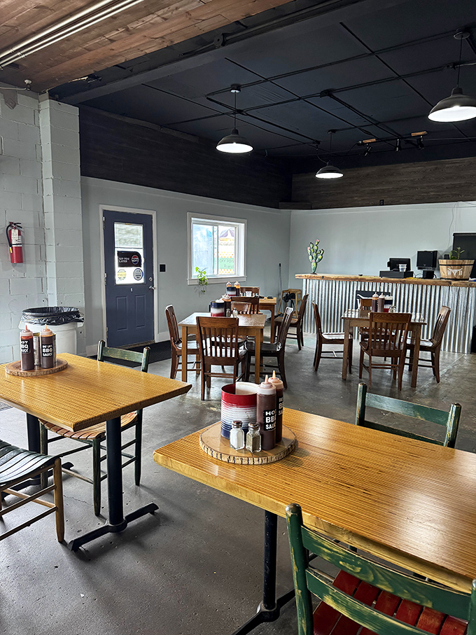 Simple wooden tables, practical chairs, and sauce bottles at the ready. This dining room says, "We put our energy into the meat, not the d&eacute;cor."