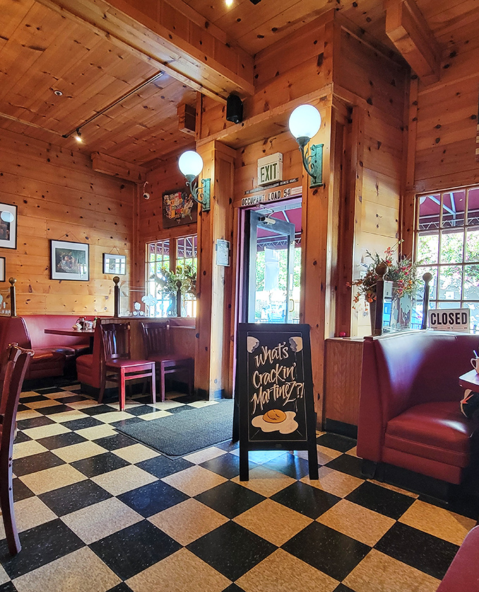 The warm wood paneling creates a cabin-meets-diner vibe that feels like visiting your favorite aunt's kitchen.