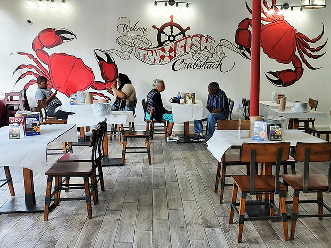 Clean lines and crab murals set the stage for the delicious chaos about to unfold on your table.
