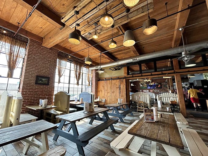 Industrial chic meets backyard comfort &ndash; exposed brick and warm wood create the perfect backdrop for meat-induced happiness.