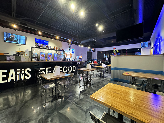 Modern meets maritime in this sleek dining room where blue accents whisper "ocean" without shouting it.