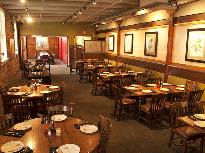 Exposed brick and warm lighting create the perfect backdrop for your impending journey into pork paradise.