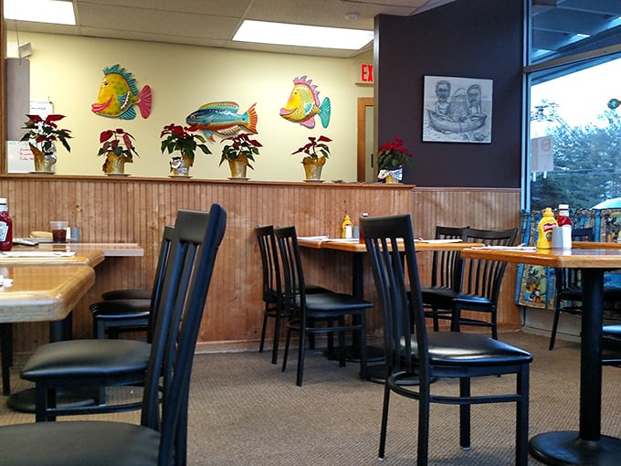 Colorful fish decorations swim above wooden paneling, creating that perfect "I've discovered a local gem" atmosphere that makes food taste even better.