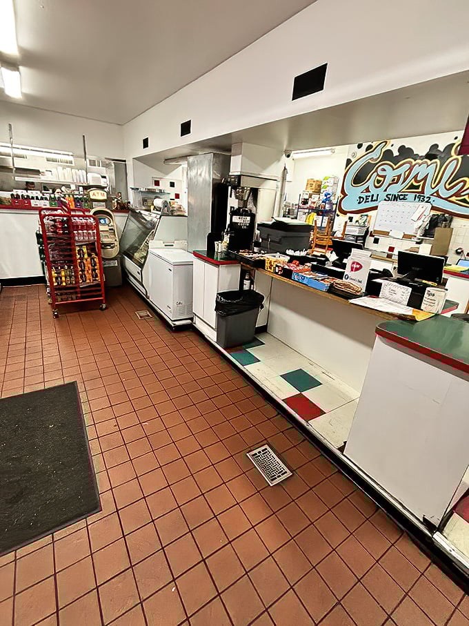 Step inside to a world where tile floors and deli counters set the stage for sandwich artistry that's been perfected over decades.
