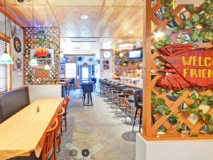 Step inside and suddenly you're family. Wooden paneling, nautical touches, and that "WELC FRIEND" sign tell you everything about the warmth waiting at your table.