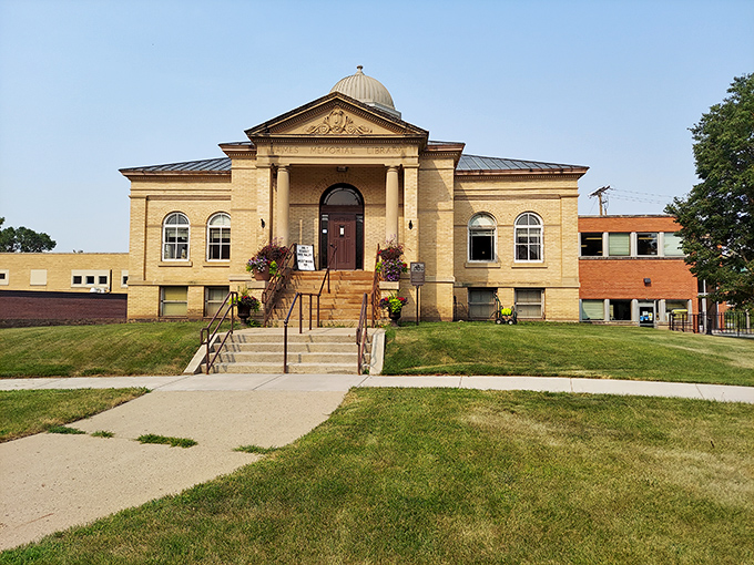 The James Memorial Art Center stands as an architectural masterpiece with its neoclassical design, golden brick, and welcoming steps that practically beckon visitors inside.