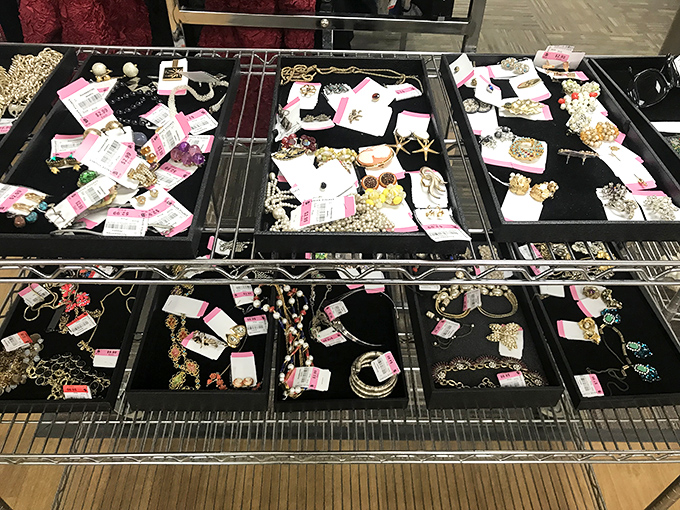 Jewelry hunters, prepare for sensory overload! These trays of sparkly possibilities are like archaeological digs where every discovery comes with its own pink price tag.
