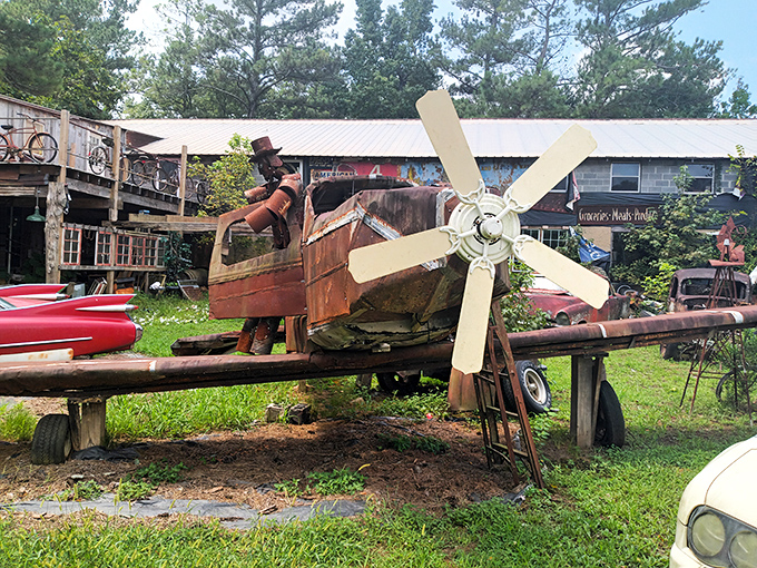 Imagination takes flight! Someone transformed ordinary junk into an extraordinary airplane sculpture, proving one person's trash truly is another's treasure.