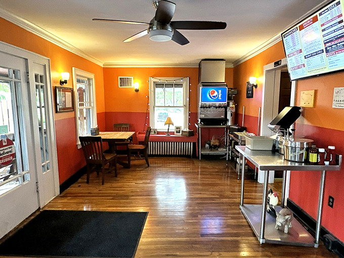 Orange walls warm as embers create the perfect backdrop for barbecue contemplation. This is where meat dreams are made and diets come to die.