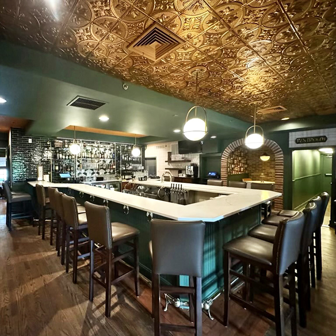 That ornate ceiling isn't showing off&mdash;it's setting the stage. The bar at Creed's combines old-world craftsmanship with modern comfort, like a well-aged Manhattan.