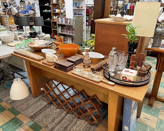 A perfectly staged vignette that whispers, "Your dinner parties could be this fabulous." That wooden wine rack alone has probably seen more sophisticated soir&eacute;es than most of us.