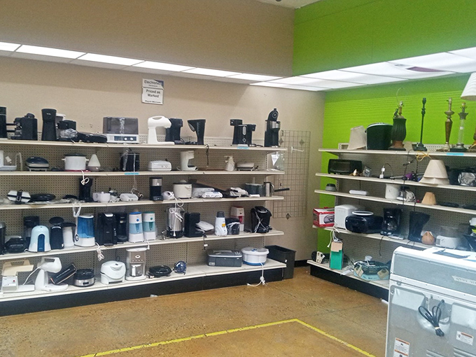 Coffee makers lined up like hopeful contestants waiting for their second chance at caffeinated glory and redemption.