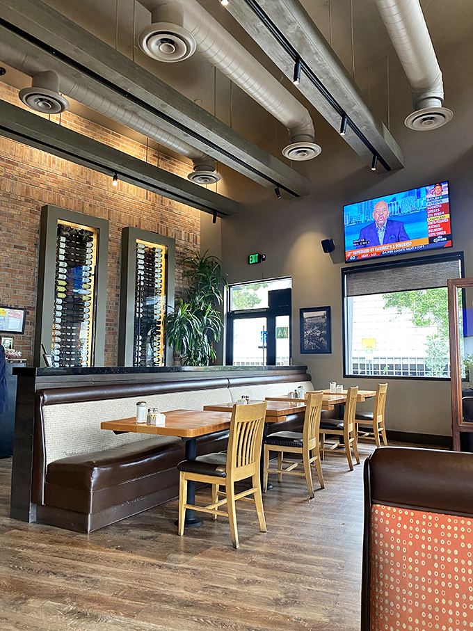 Exposed brick walls, elegant wine displays, and comfortable seating create that perfect "third place" between home and work where conversations flow as freely as the coffee.