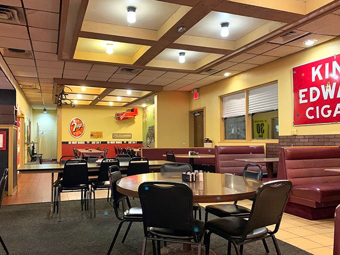 Burgundy booths, wooden beams, and vintage decor create that perfect diner atmosphere where comfort begins before the food even arrives.