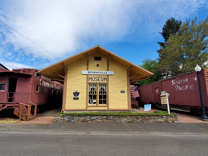 The sunny yellow Brownsville Museum, flanked by vintage train cars, houses treasures that tell the town's story better than any history book ever could.