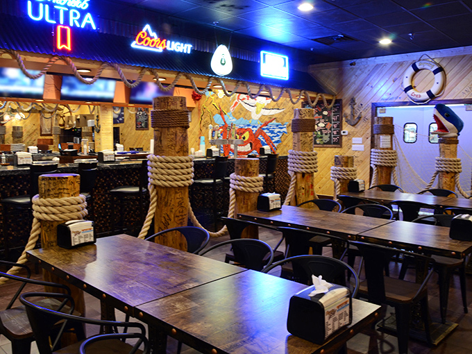 Nautical charm meets casual comfort inside, where rope-wrapped posts and maritime decor set the stage for the messy deliciousness to come.