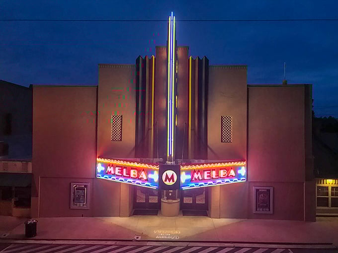 At night, the Melba's Art Deco façade transforms into a luminous beacon, drawing locals like moths to a nostalgic flame.