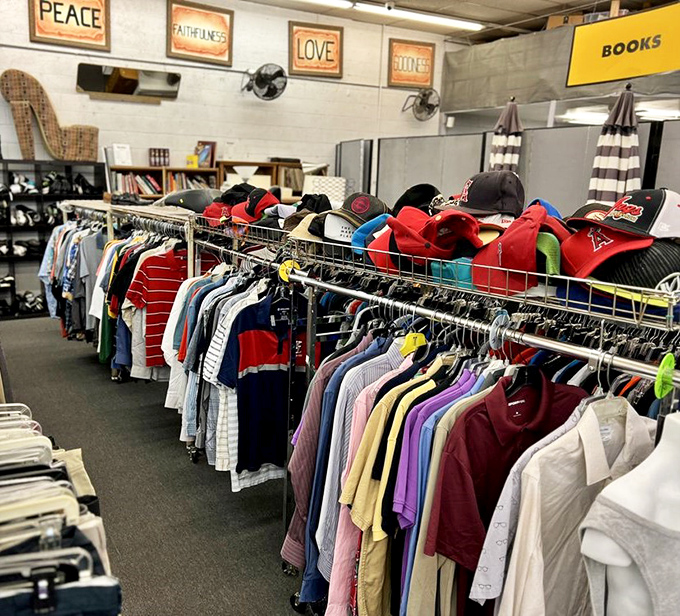 Racks stretching into the distance like a fabric rainbow, where someone's discarded polo shirt becomes your new favorite weekend wear.