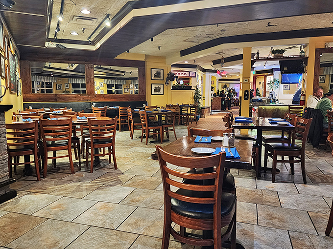 Warm yellow walls and wooden accents create that "Nonna's dining room meets California casual" vibe that makes you want to linger over another glass of wine.