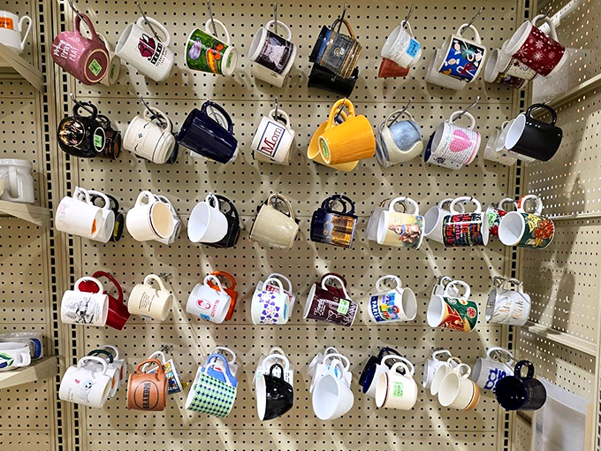A rainbow wall of mugs awaits, each one holding stories of morning coffees and midnight teas from decades past.