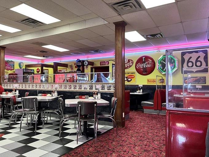 Neon pink lights illuminate chrome and checkerboard floors&mdash;this isn't retro by design, it's authentic by survival.