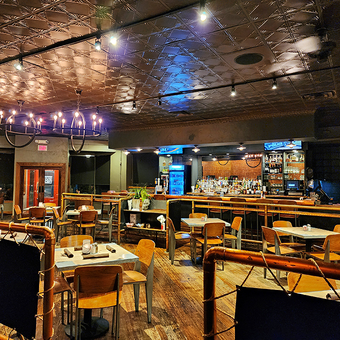 Step inside to discover rustic-industrial charm with pressed tin ceilings, wooden floors, and an atmosphere that says "stay awhile."