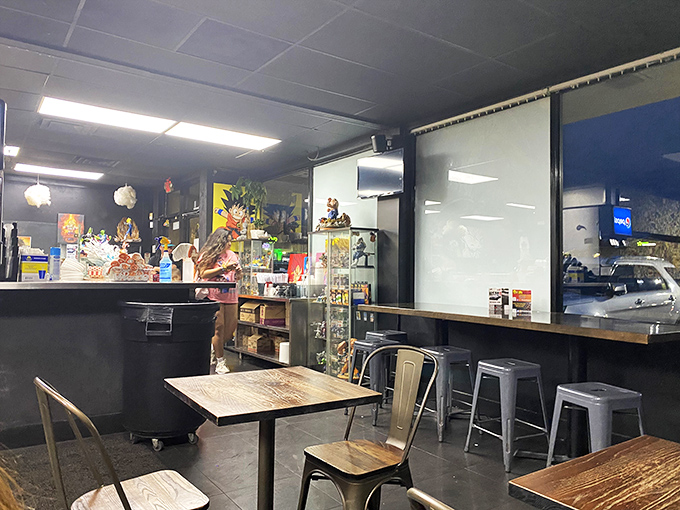 Industrial-chic meets anime obsession in this cozy dining space. Metal stools and wooden tables create the perfect backdrop for slurping noodles and spotting collectibles.