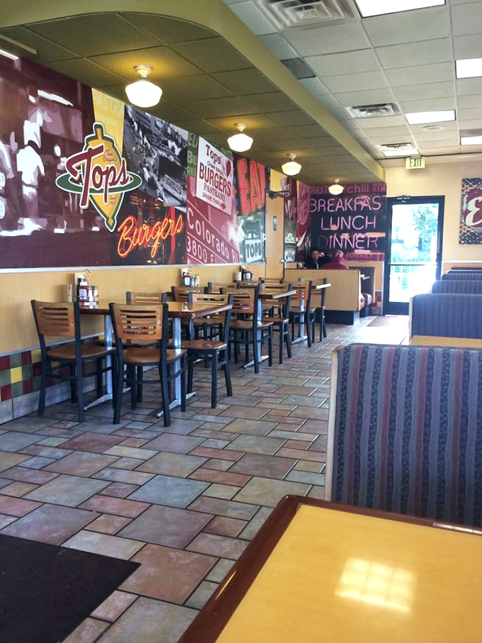 Colorful walls tell the story of burger history while comfortable booths invite you to become part of it.