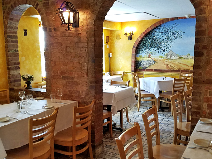 Step inside and you're transported to Italy through rustic brick archways, golden walls, and a mural that's basically a passport stamp for your taste buds.
