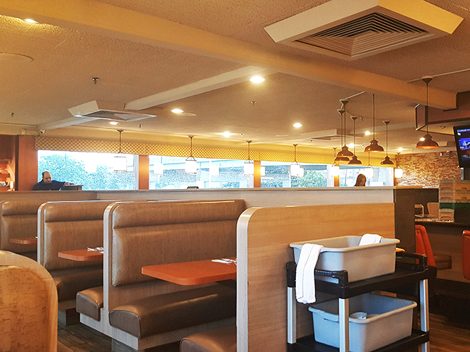 Classic diner booths where countless life stories have unfolded over coffee refills and comfort food conversations.