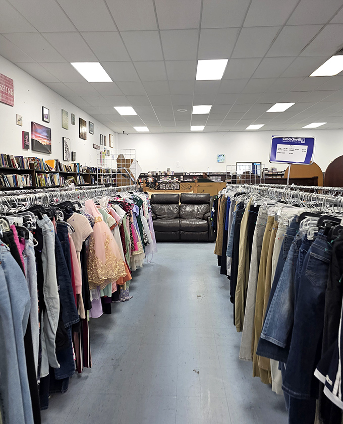 Rows of clothes stretch toward infinity like a fabric-covered highway leading to your next wardrobe transformation.