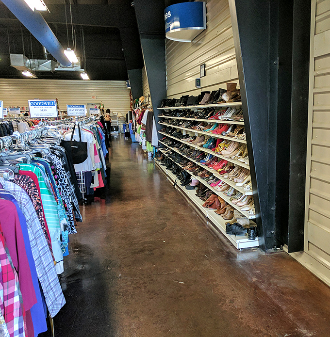 Endless racks stretch toward the horizon, proving that one person's closet purge is another person's wardrobe goldmine.