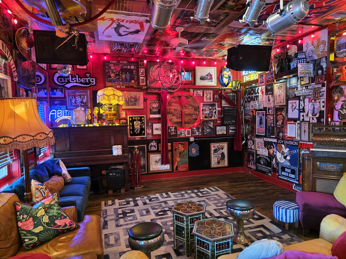 Walking into The Red Bar feels like stumbling into rock 'n' roll's attic—every inch plastered with memorabilia that tells stories even before your server arrives.