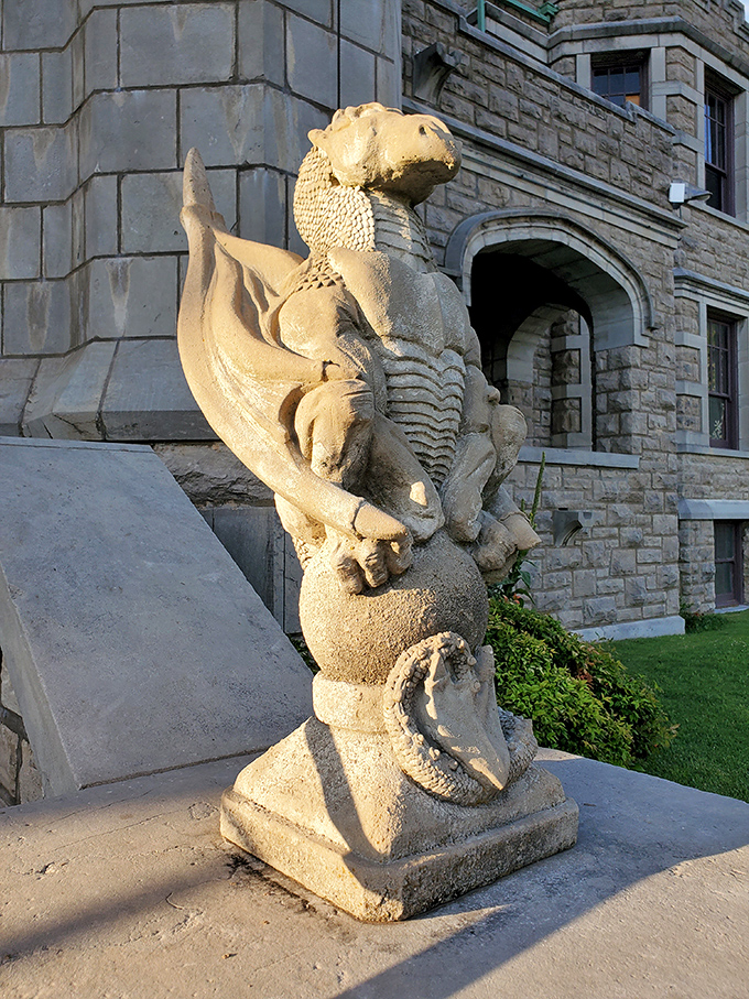 This stone dragon stands sentinel at the castle entrance, silently judging whether you're worthy of entering&mdash;or perhaps just tired of tourists asking if it breathes fire.
