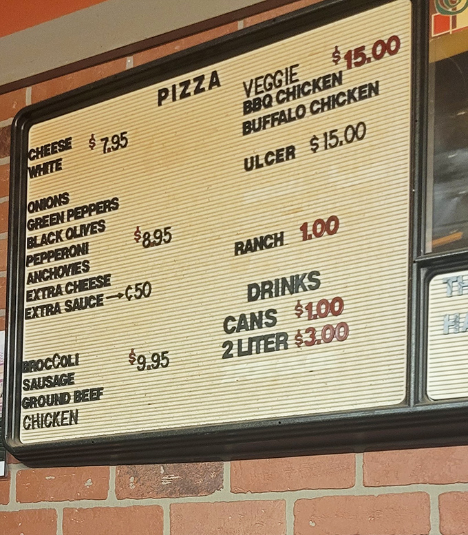 The no-frills menu board tells you everything you need to know: this place is about pizza, not pretense. The mysterious "Ulcer" pizza awaits the brave.