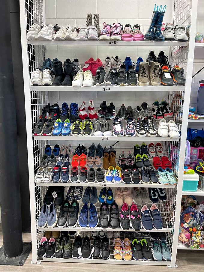 A shoe lover's dream! Row after row of footwear awaits new owners, organized by size for easy browsing. Cinderella would have found her match in minutes. 